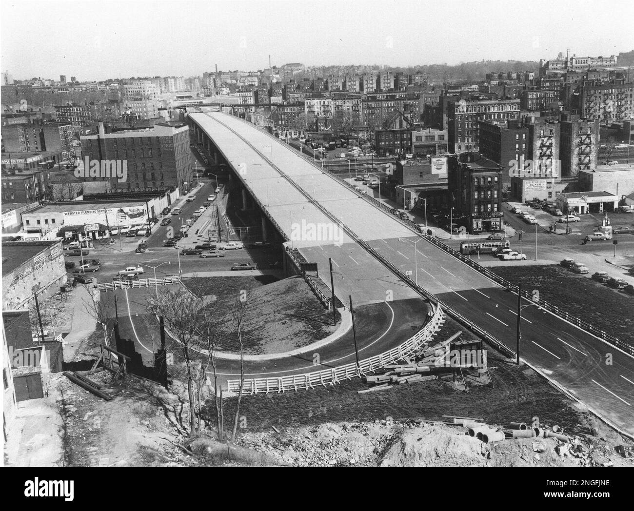 This aerial view shows the Cross-Bronx Expressway, looking east at ...