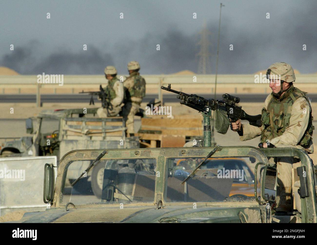 Soldiers with the 82nd Airborne Division man a coaltion checkpoint in ...
