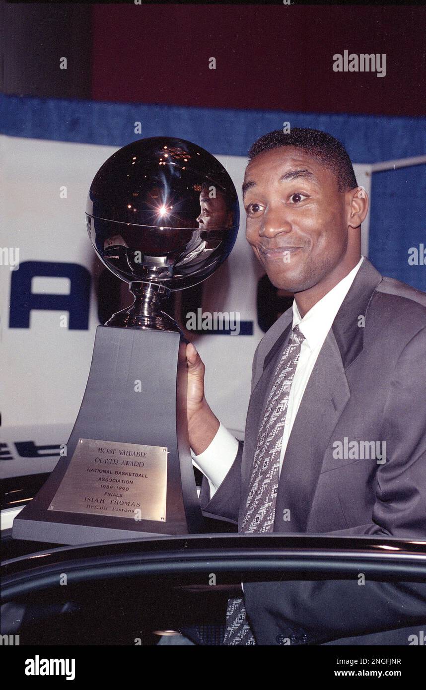 Detroit Pistons guard and captain Isiah Thomas holds the 1990 NBA ...