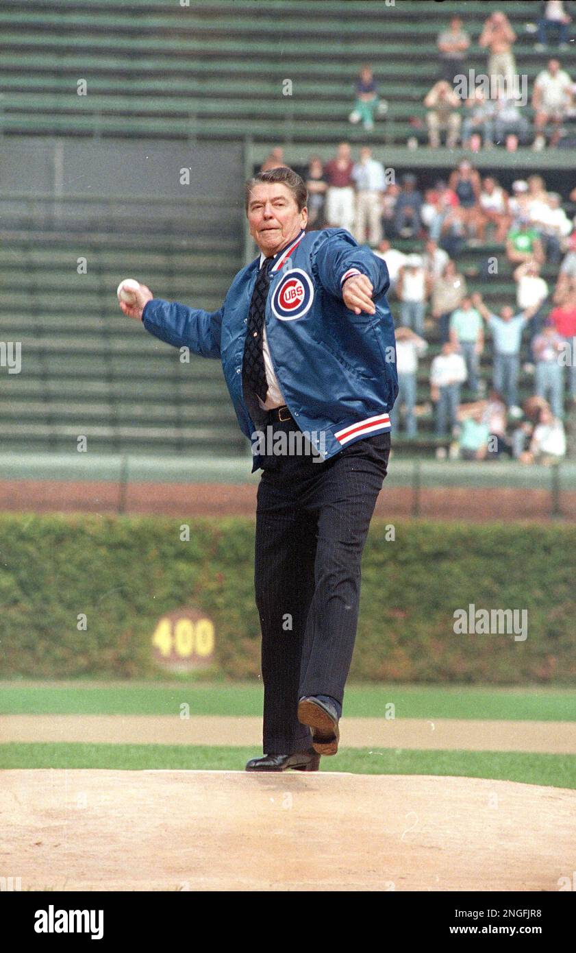 U.S. President Ronald Reagan throws out the ceremonial first pitch at ...