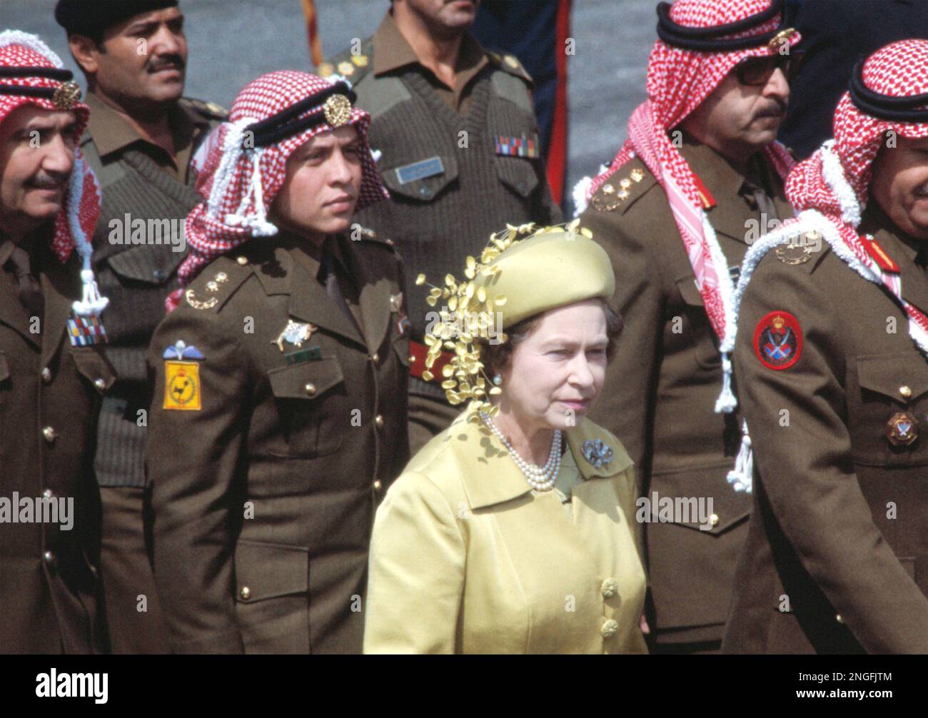 Britain's Queen Elizabeth II, with members of the Jordanian Army on her ...
