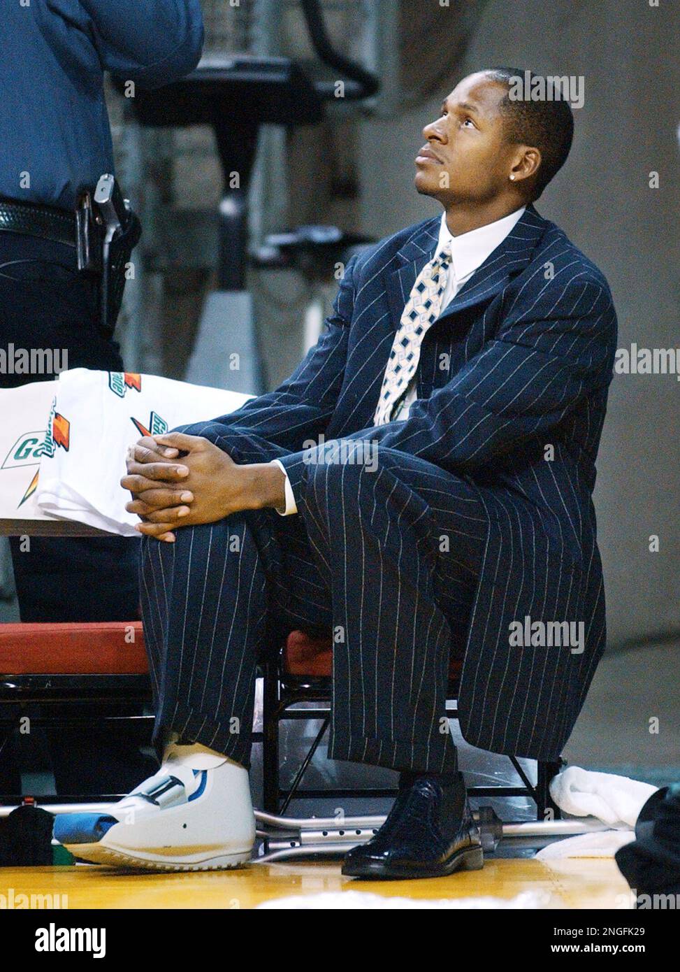 Seattle SuperSonics' Ray Allen, recovering from ankle surgery, watches ...