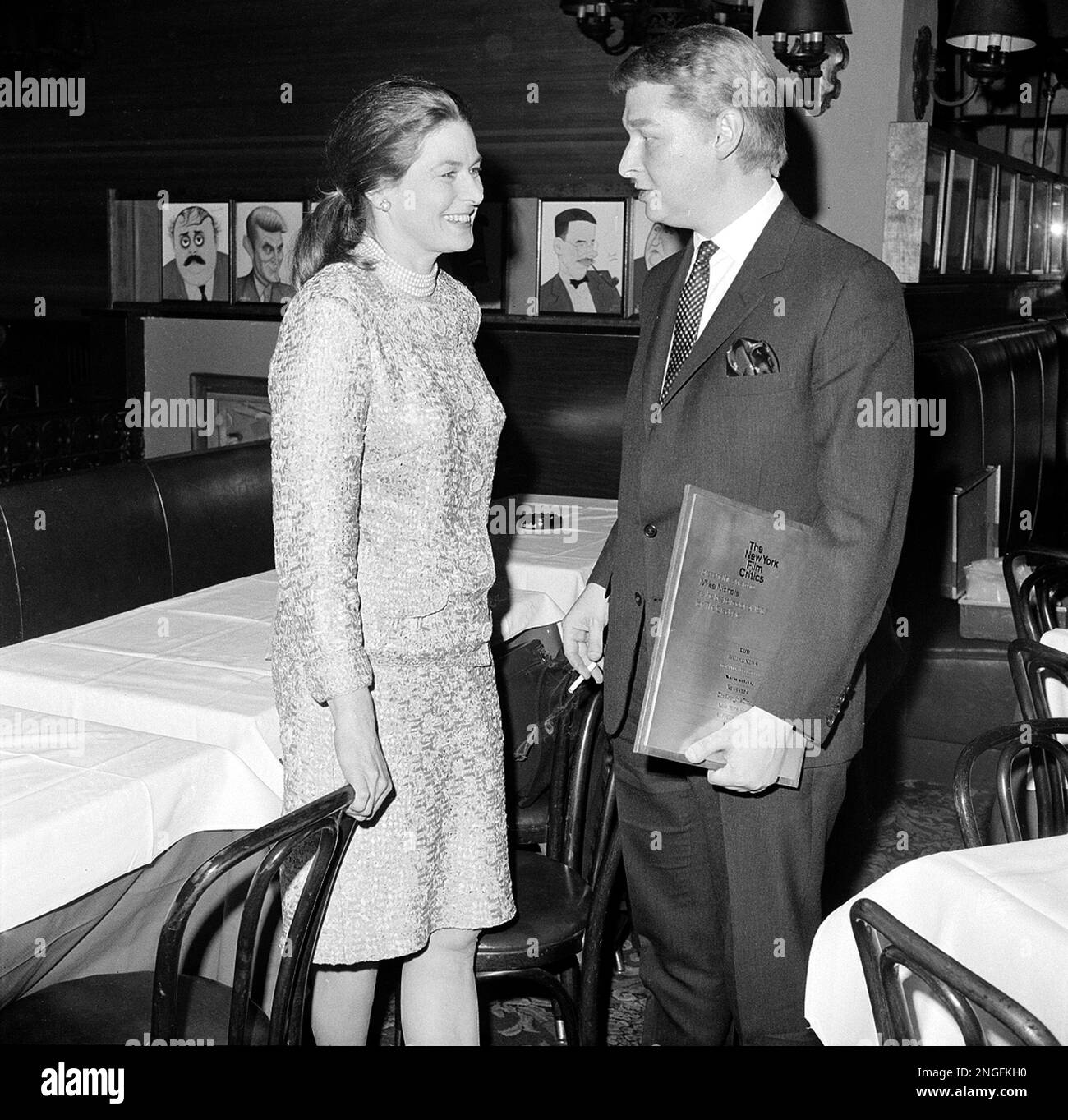 Actress Ingrid Bergman, left, talks with director-actor Mike Nichols at ...