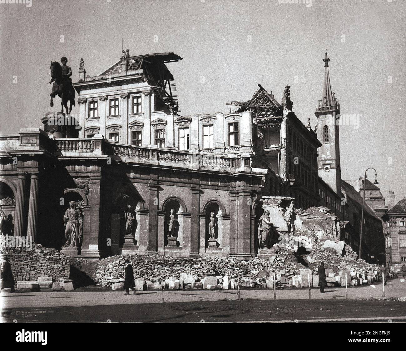The statue of Franz Josef on horseback, left, stands intact near the ...