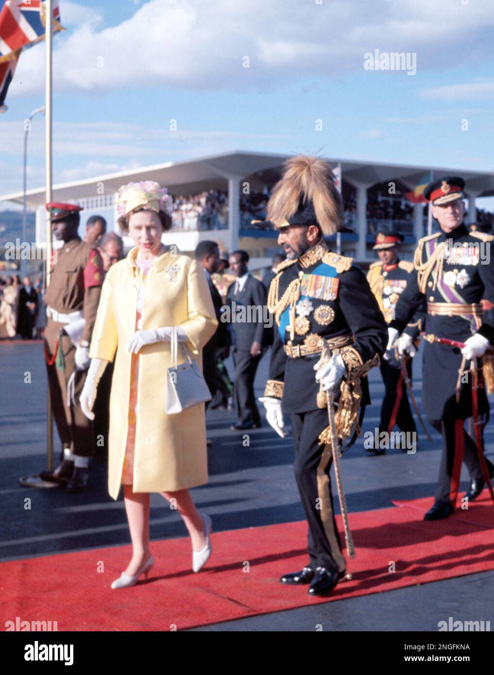 Britain's Queen Elizabeth II walks beside Ethiopian Emperor Haile ...