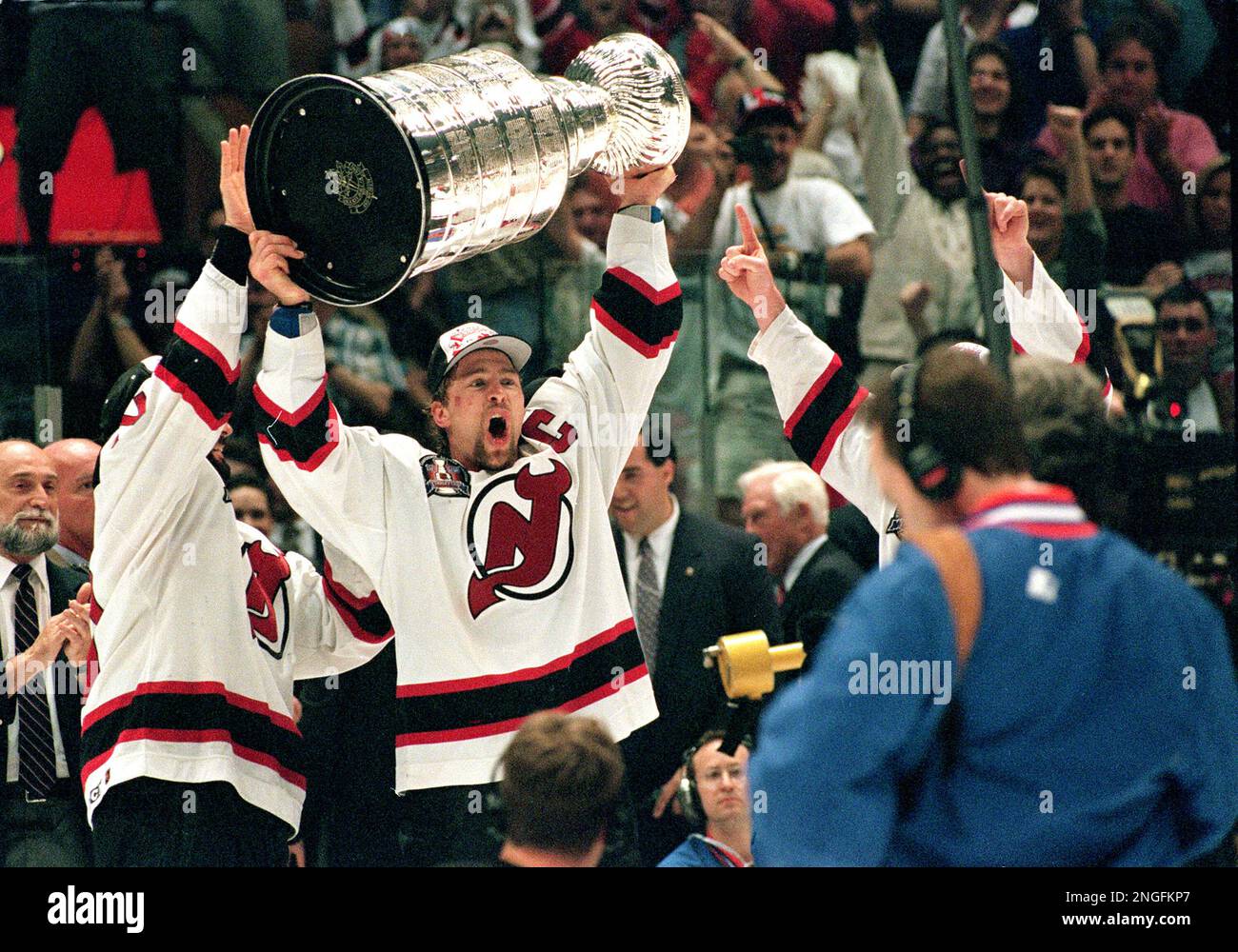 New Jersey Devils team captain Scott Stevens holds up the Stanley Cup ...