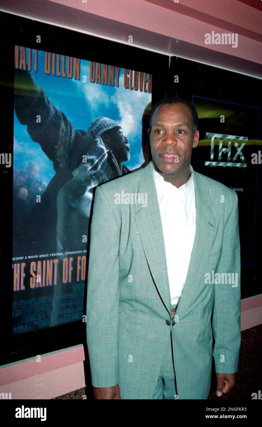 Actor Danny Glover poses in front of a poster advertising his motion ...
