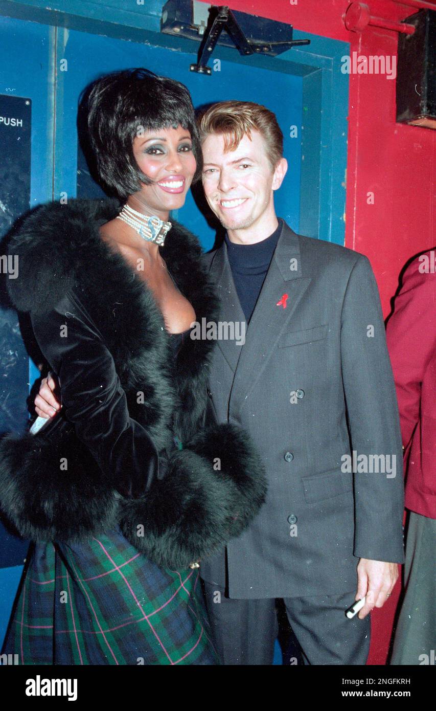 British rock singer David Bowie and his wife, supermodel Iman, are seen ...