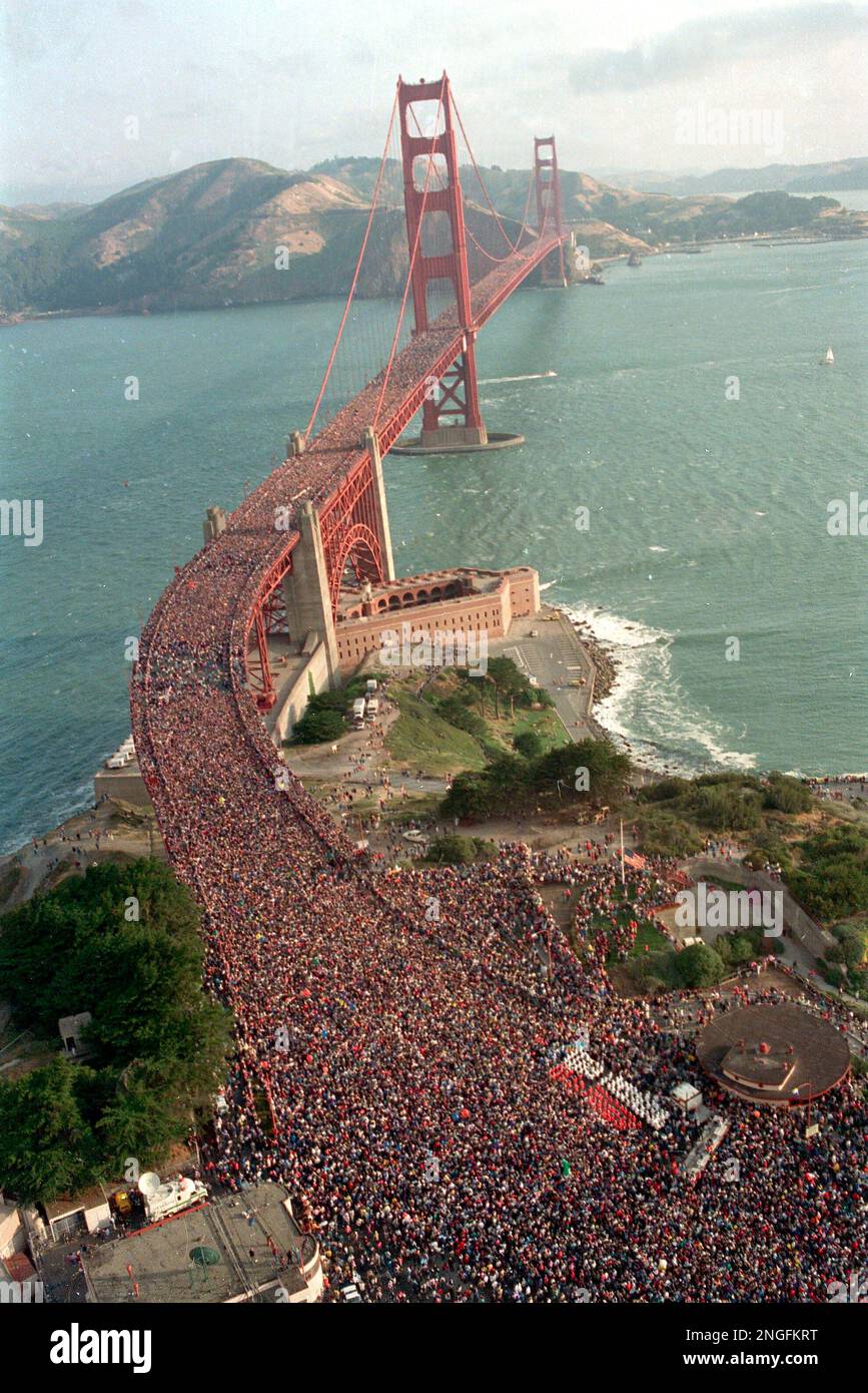 A crowd estimated at 800,000 jams the deck of the Golden Gate Bridge in ...