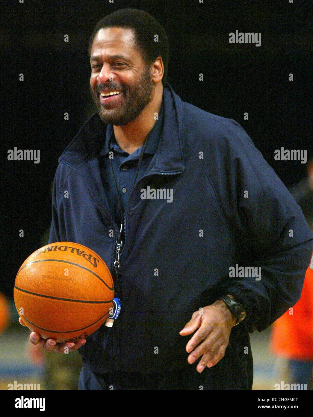 New York Knicks coach Don Chaney smiles during a practice session at ...