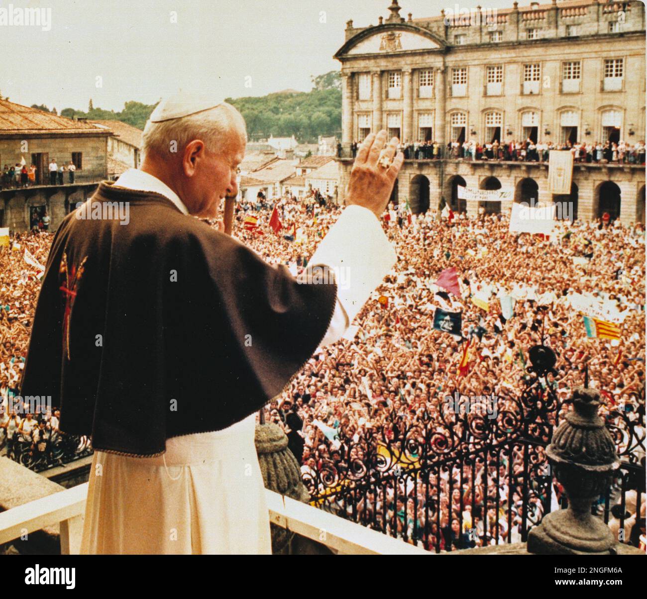 Pope John Paul II blesses the crowd on the steps of the Santiago ...