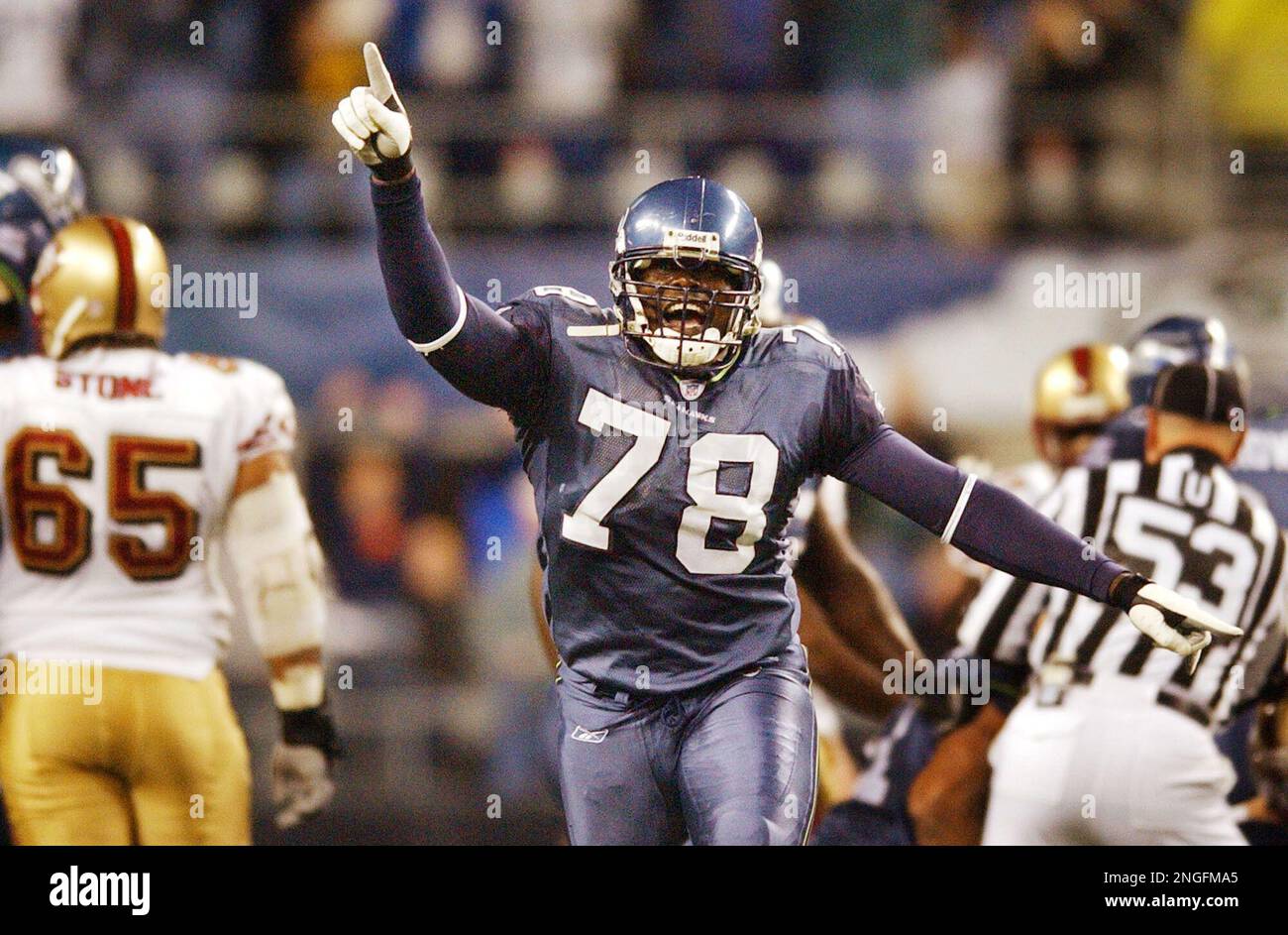 Seattle Seahawks' Antonio Cochran (78) celebrates a fumble recovery by ...