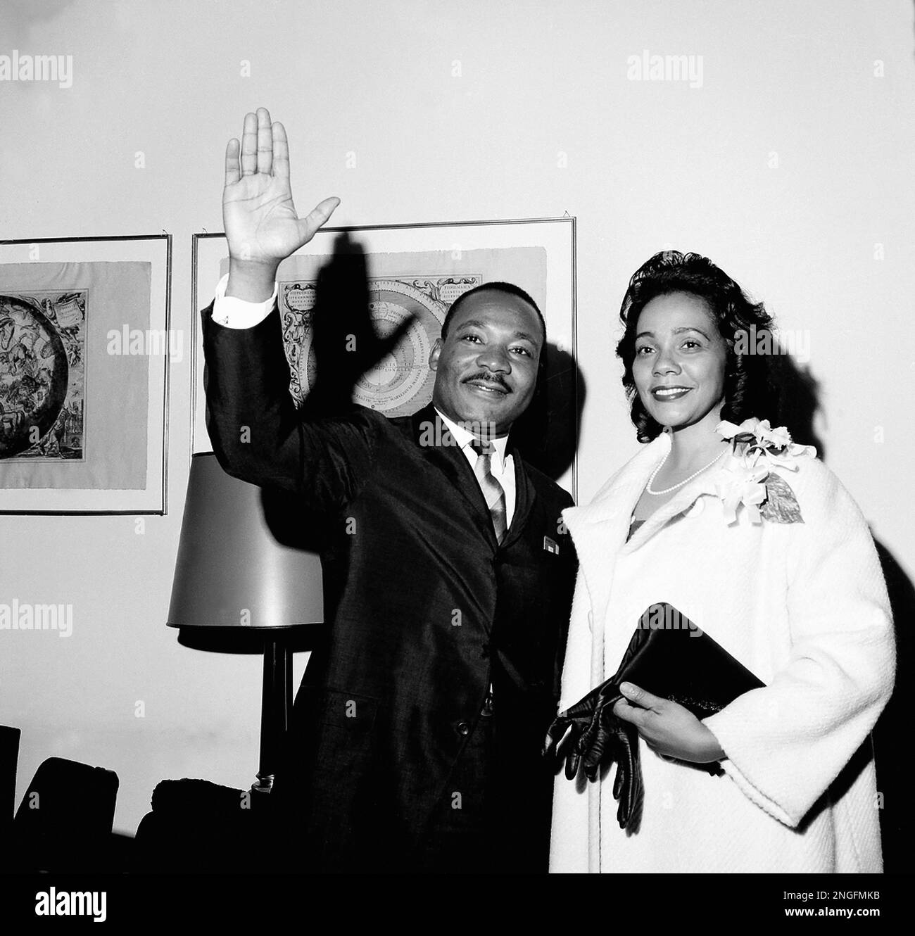 The Rev. Dr. Martin Luther King Jr. is accompanied by his wife, Coretta ...