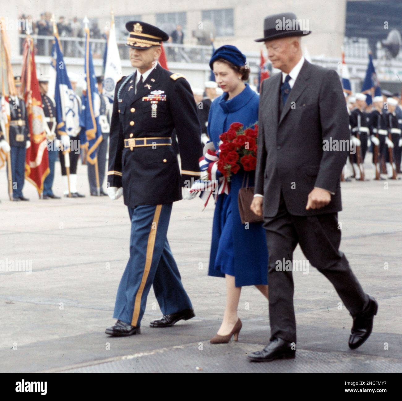 Britain's Queen Elizabeth II walks with U.S. President Eisenhower past ...