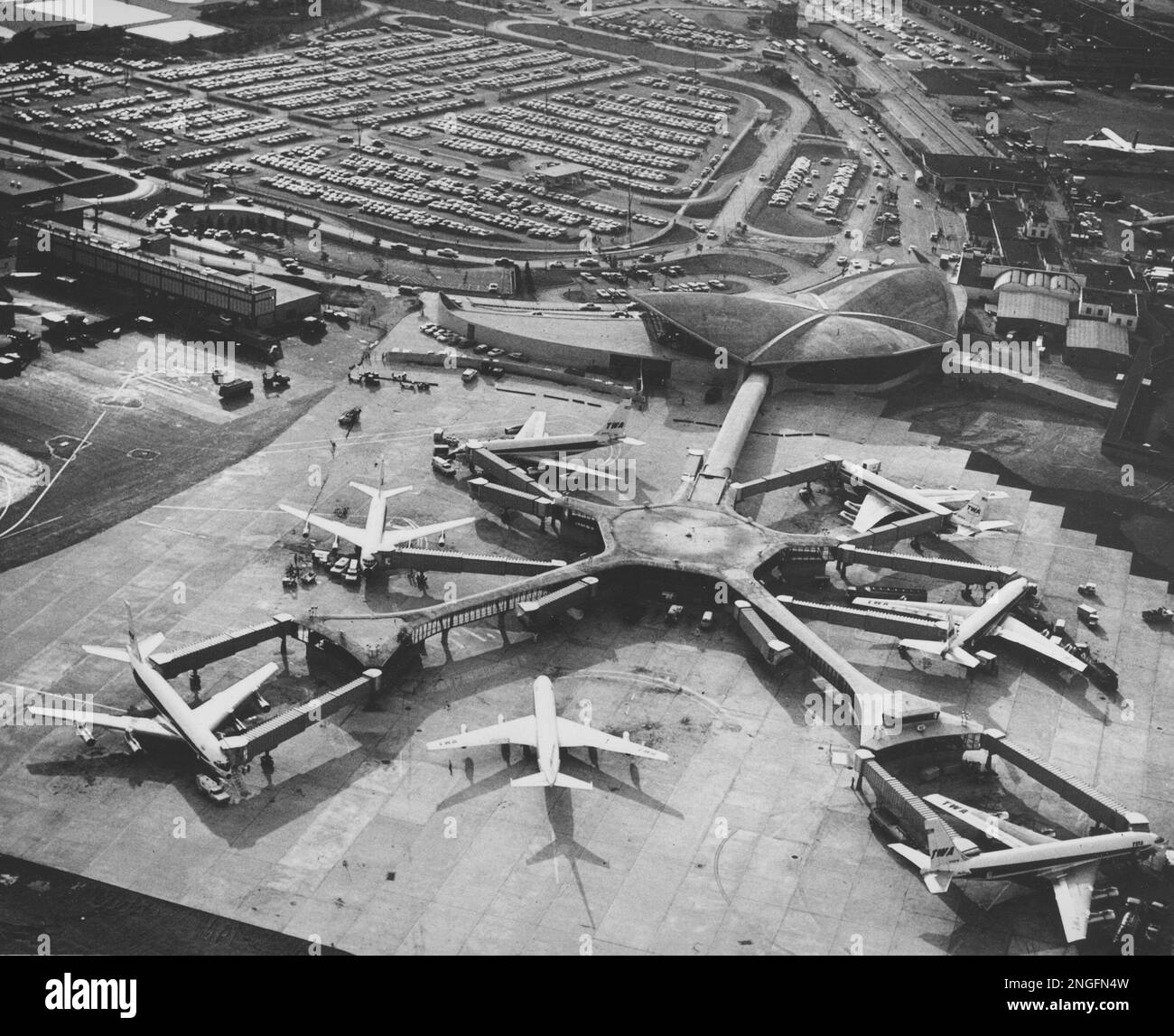 This aerial view of New York's Idlewild Airport shows the TWA Building ...