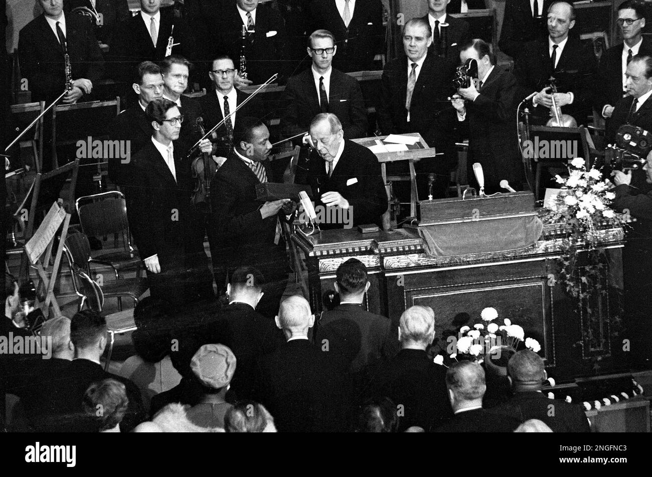 Rev. Dr. Martin Luther King, American civil rights leader, receives the ...