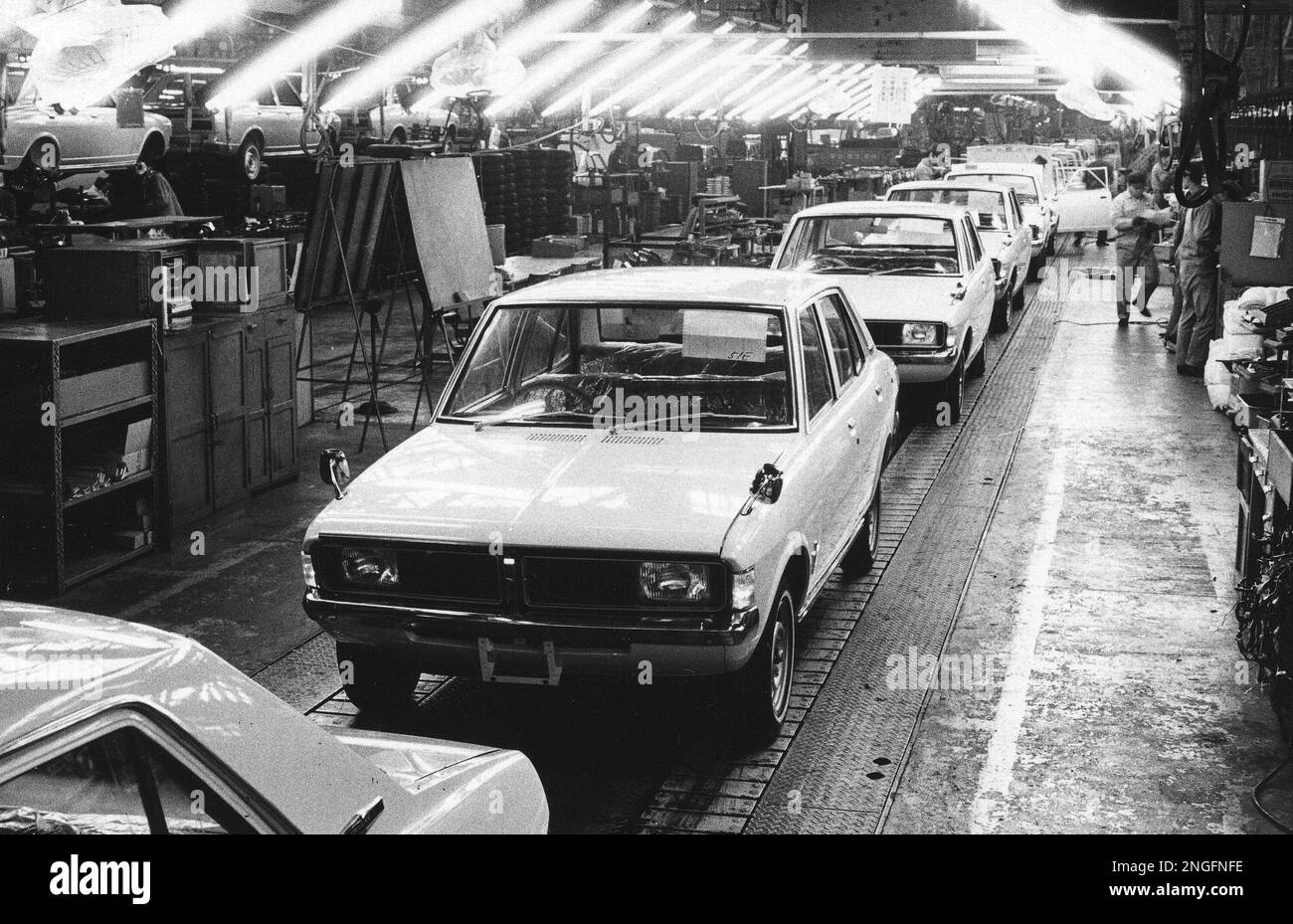 Nearly finished cars of the type Dodge Colt Galant roll down an ...