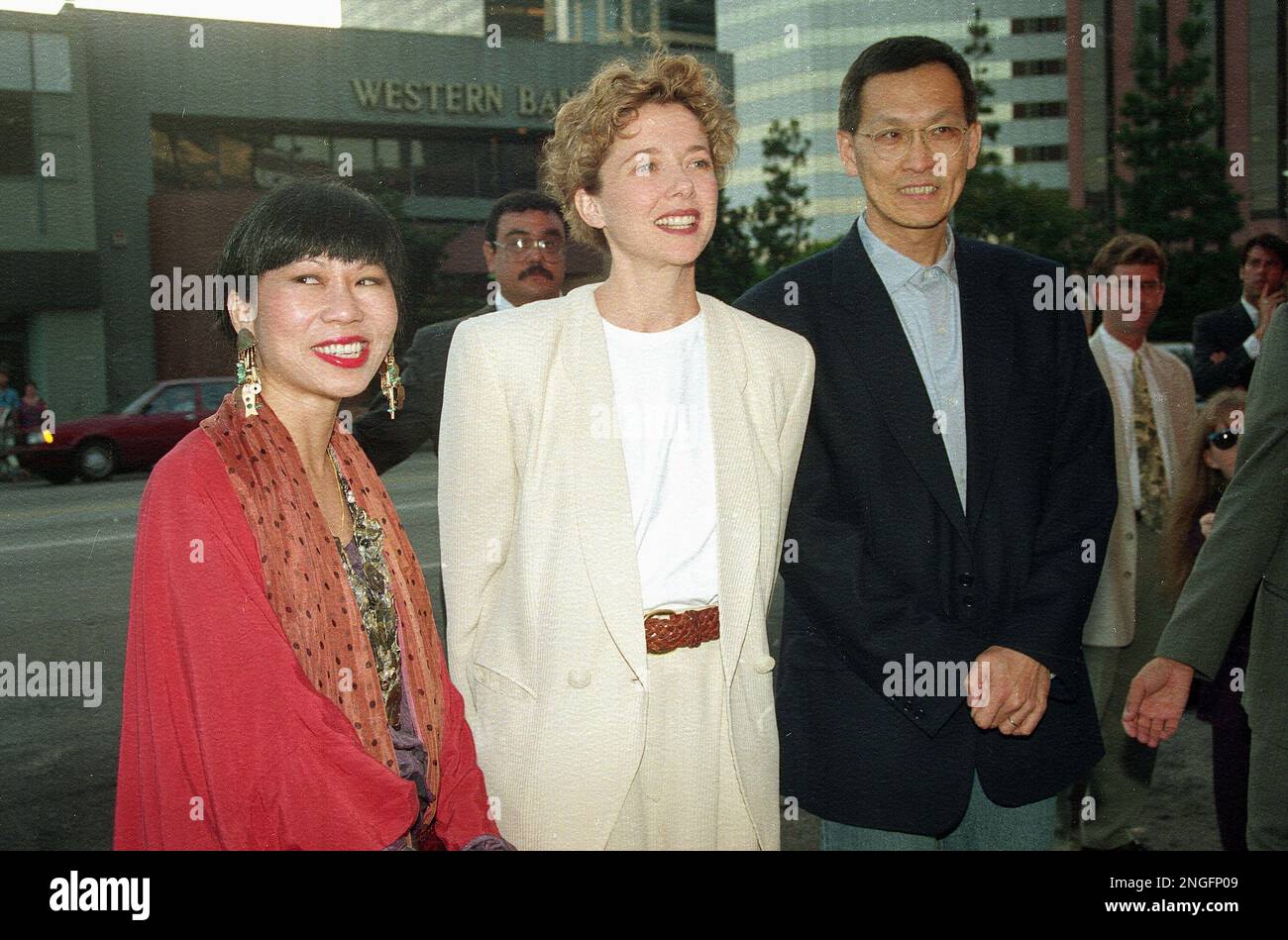 Actress Annette Bening poses between author Amy Tan and director Wayne ...