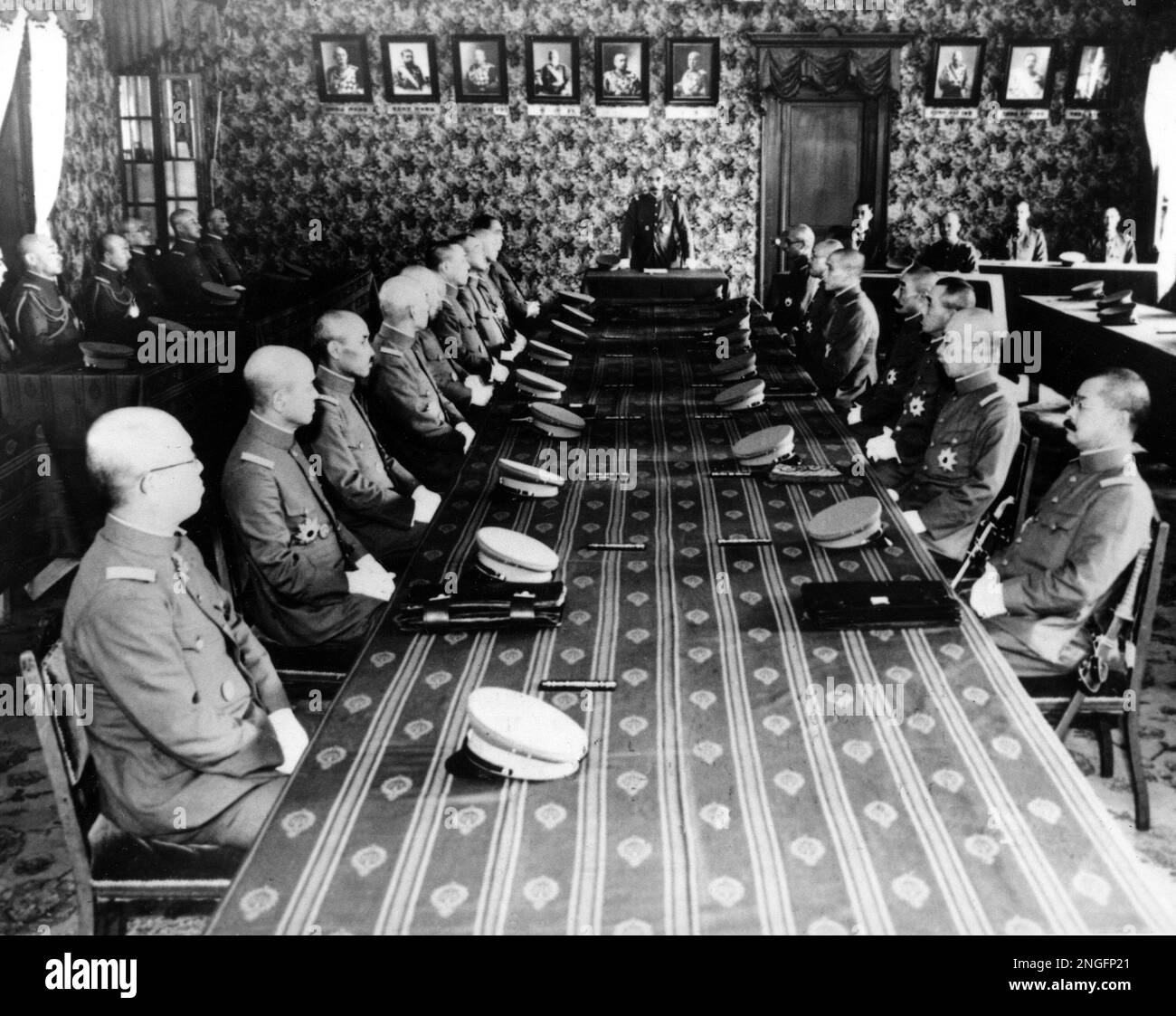 All divisional commanders of the Japanese Army are gathered at a long ...