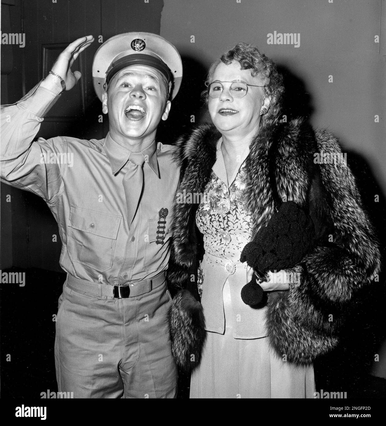 Pvt. Mickey Rooney attends a Hollywood movie premiere with his mother ...