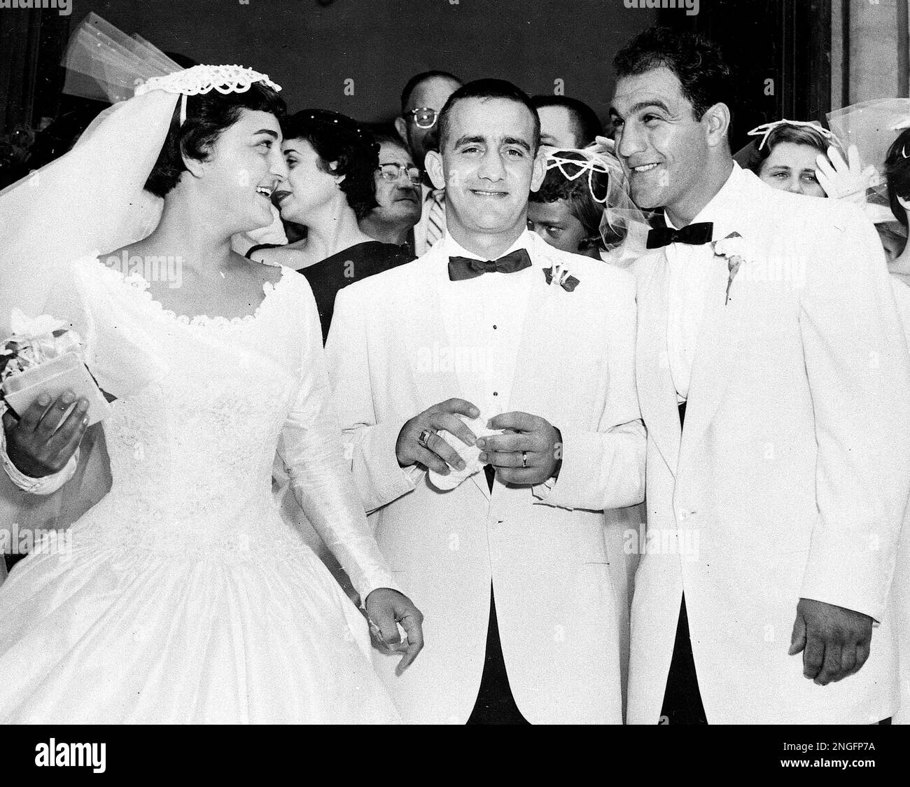 Heavyweight boxing champion Rocky Marciano, right, smiles at his sister ...