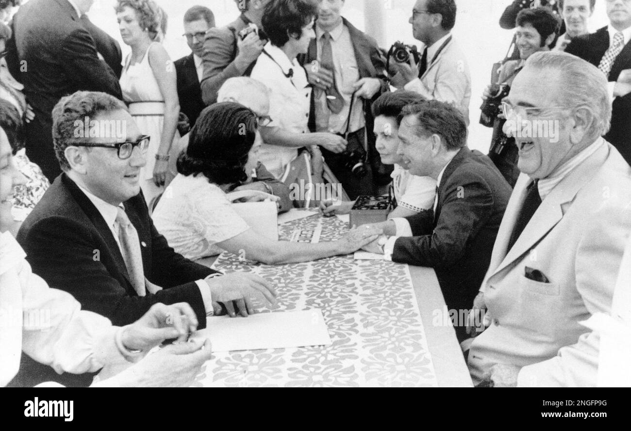 National Security Adviser Henry A. Kissinger, left, and former ...