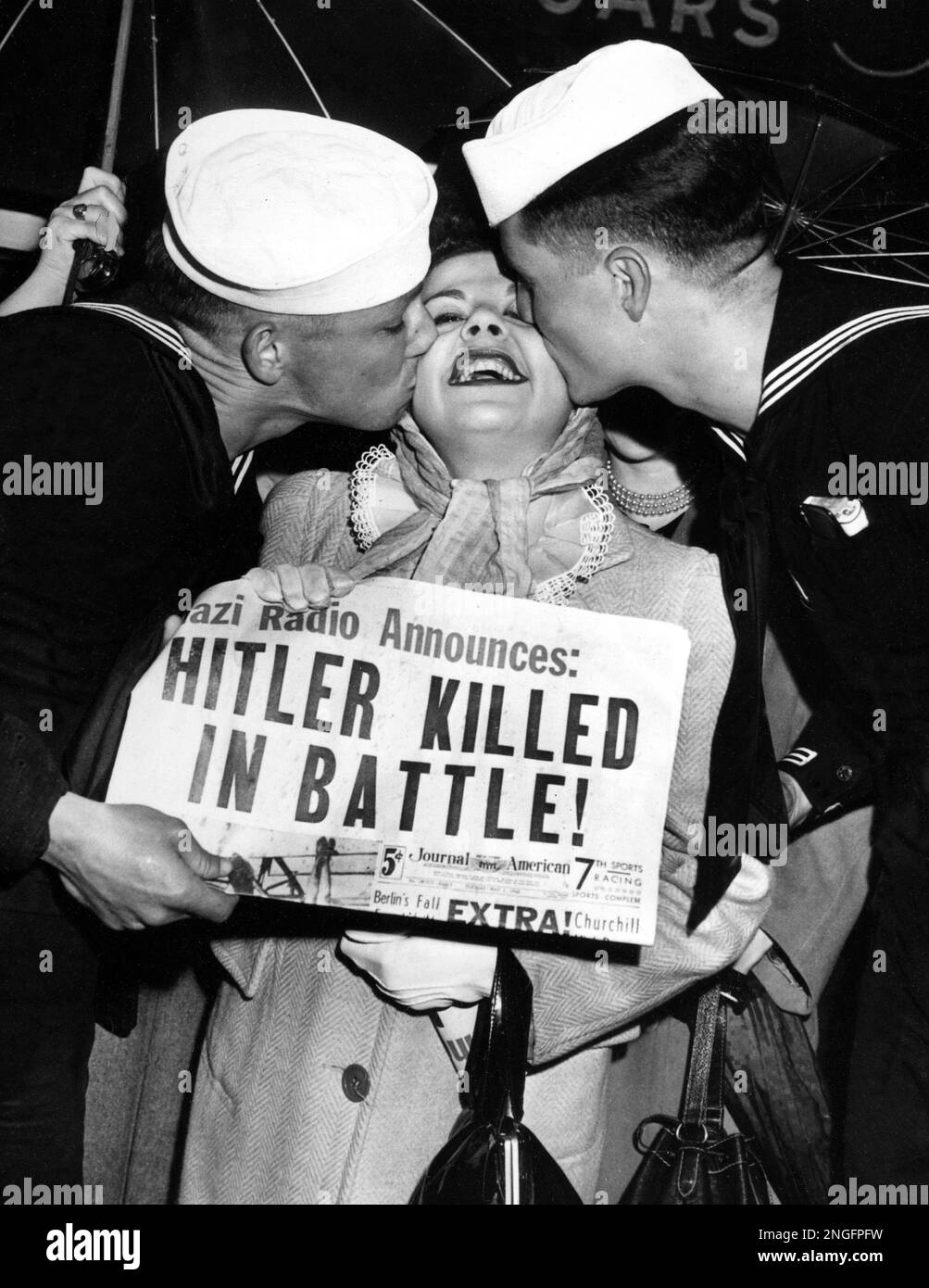 Sailors Bob Nethery, left, of Powell, Wyo., and Bob Wickford of Patterson, Calif., celebrate the ...