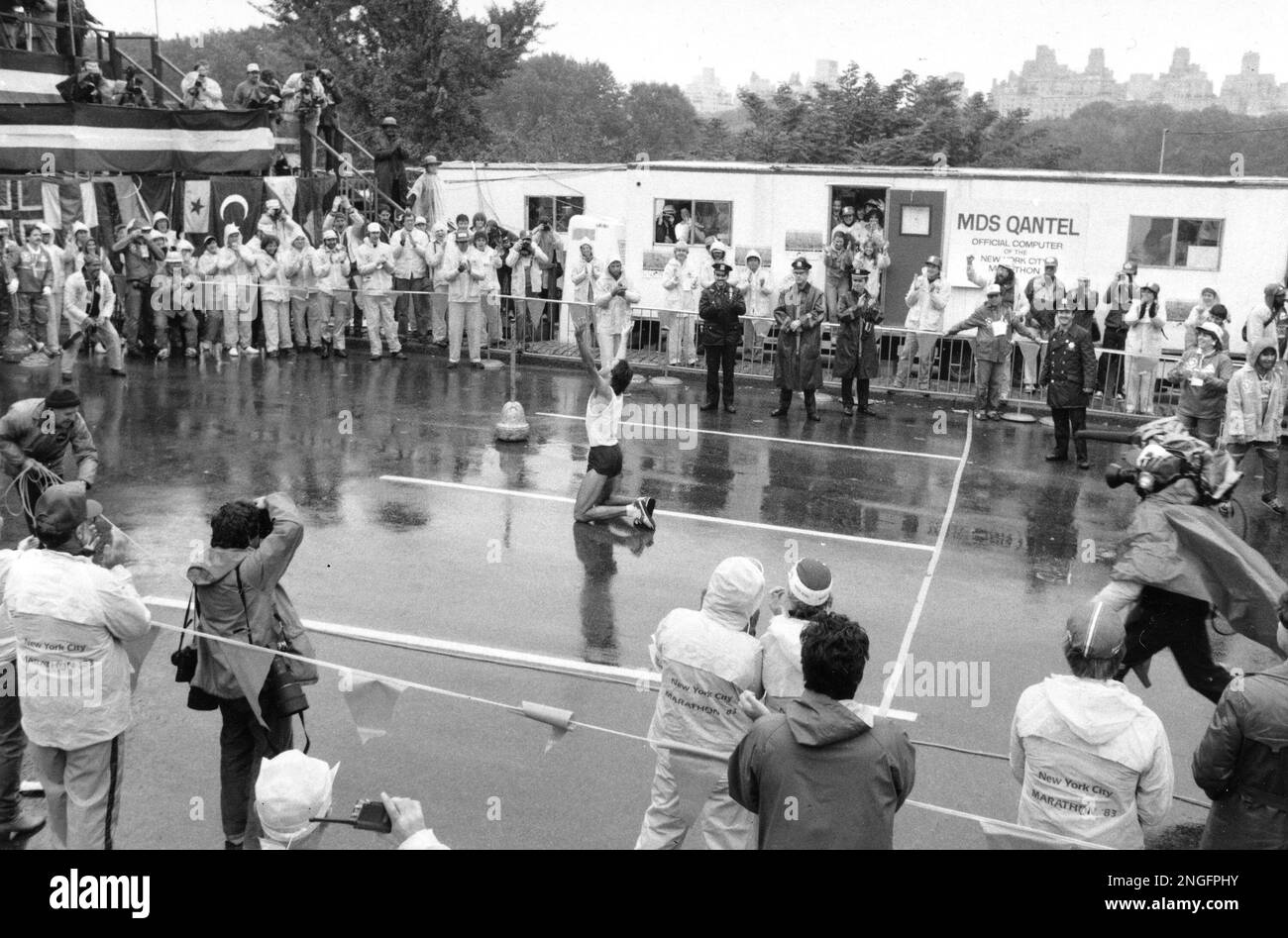 New Zealand's Rod Dixon drops to his knees after crossing the finish ...