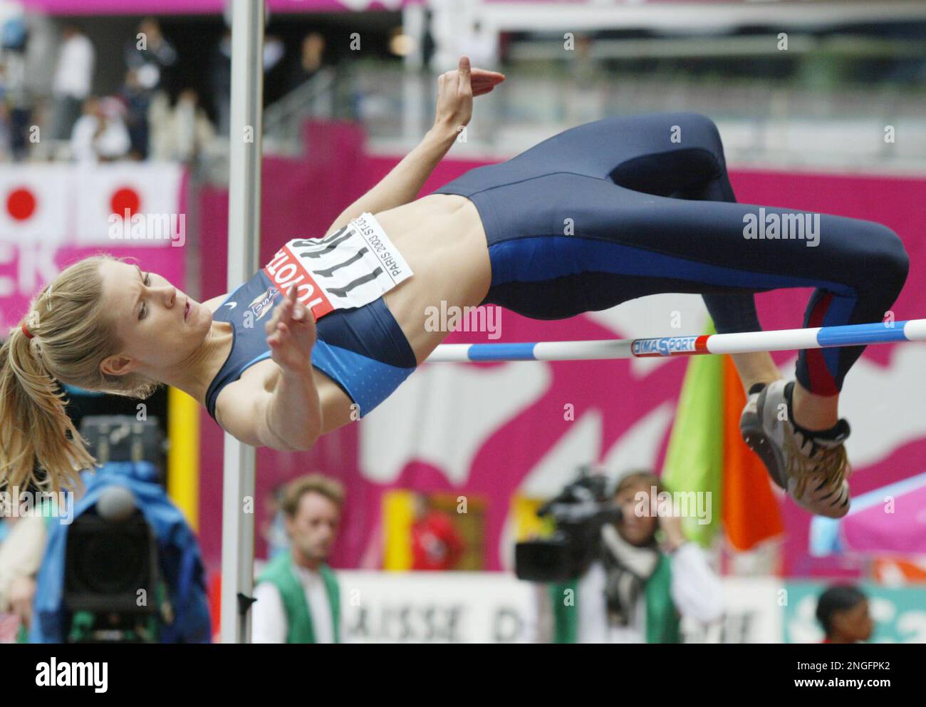Amy Acuff of the US clears the bar during the Women's high jump at the ...