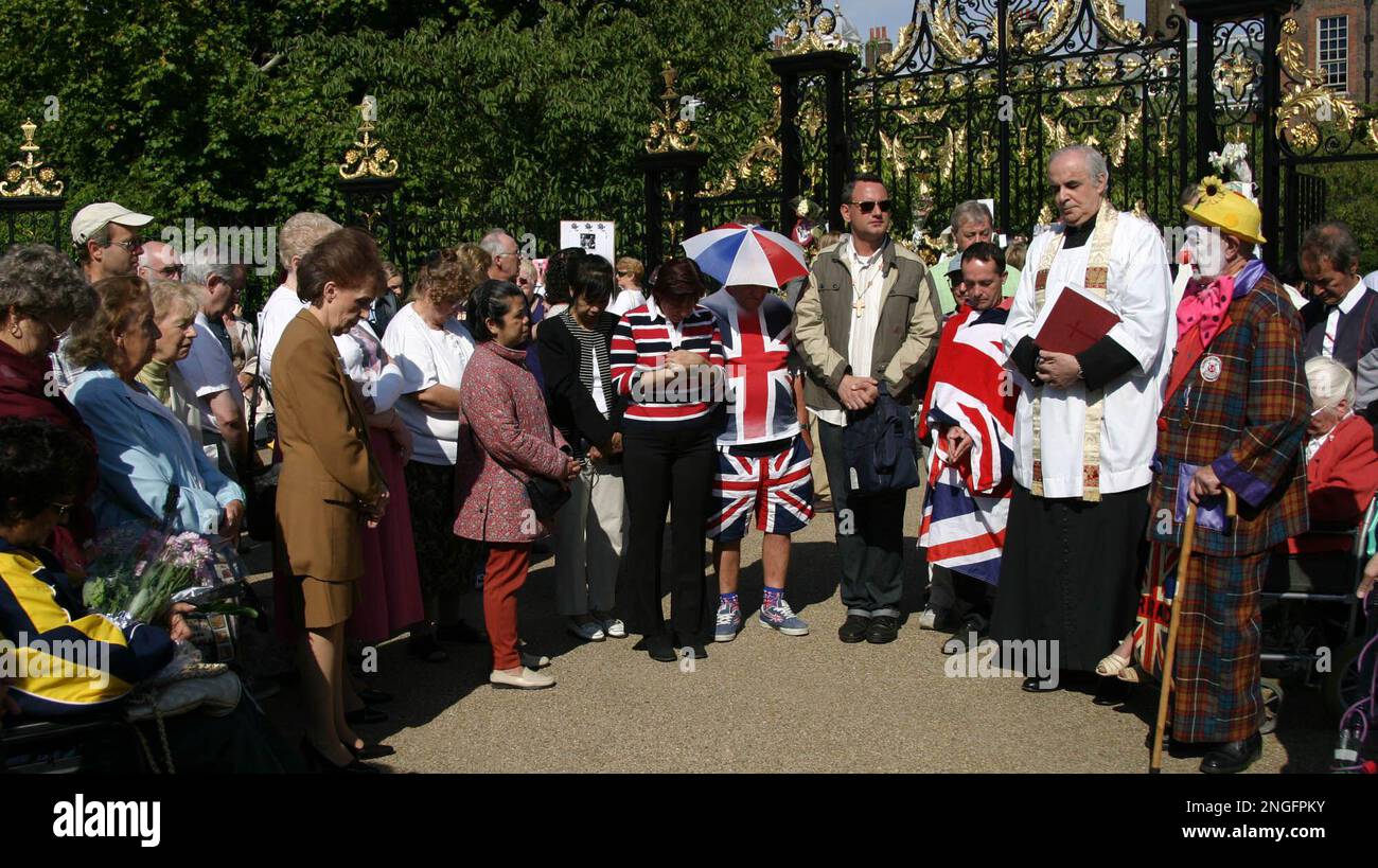 Retired priest Frank Gelli, leads an unofficial service outside ...