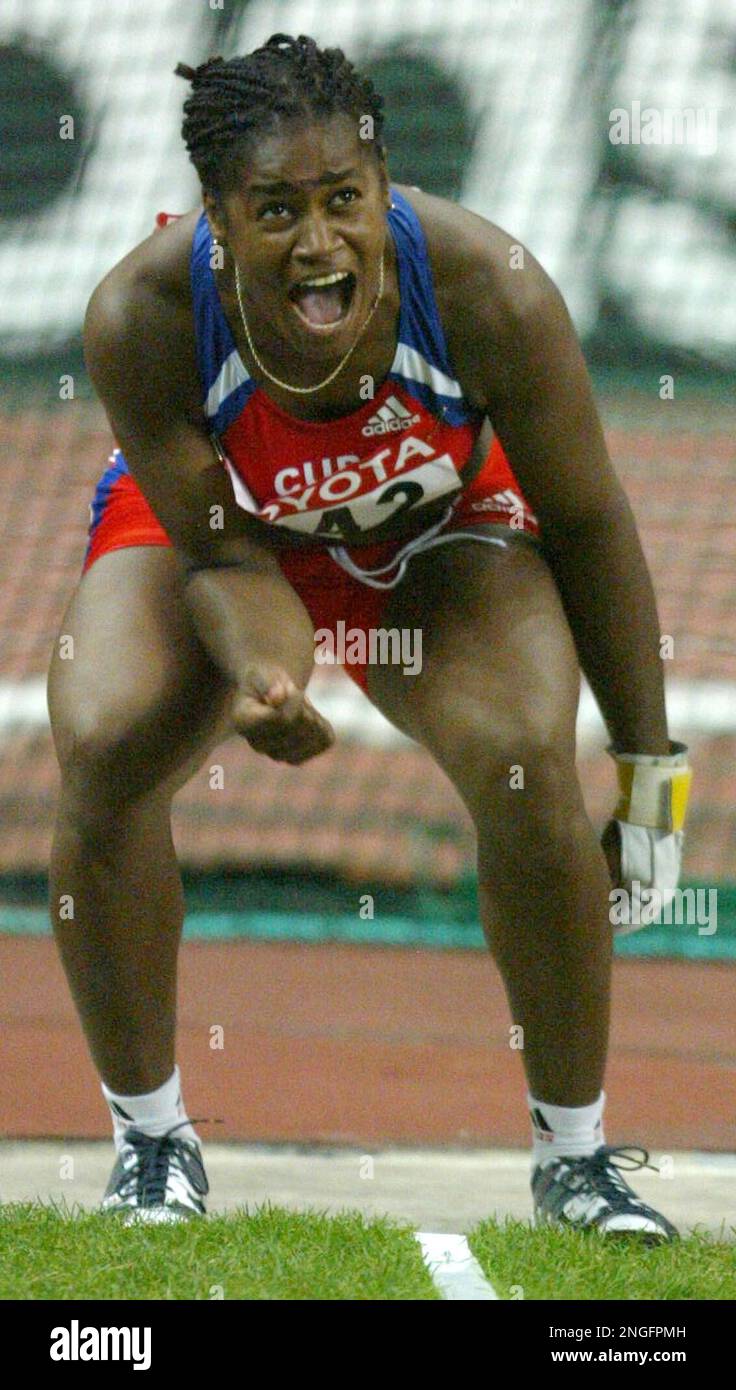 Cuba's Yipsi Moreno follows the flight of her hammer on her way to ...