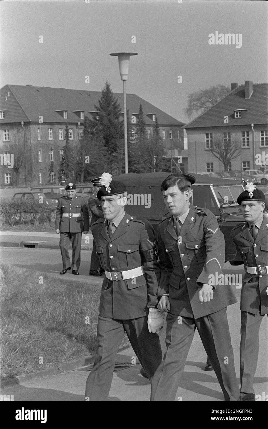 19-year-old Lance Corporal Michael Leslie Grantham is escorted into the ...