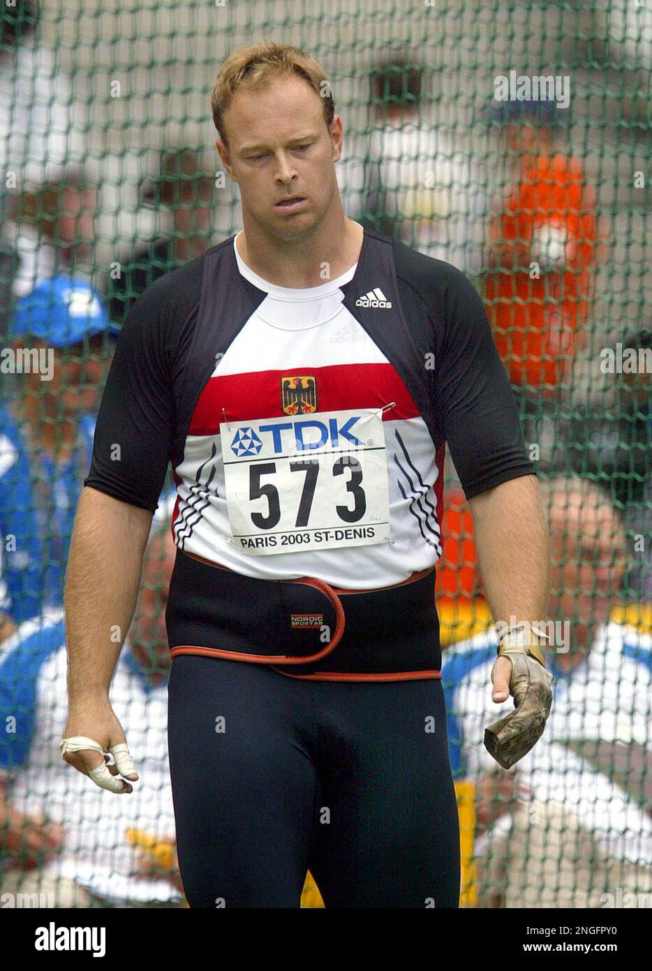 Germany's Karsten Kobs walks from the circle qualifying for the Men's ...