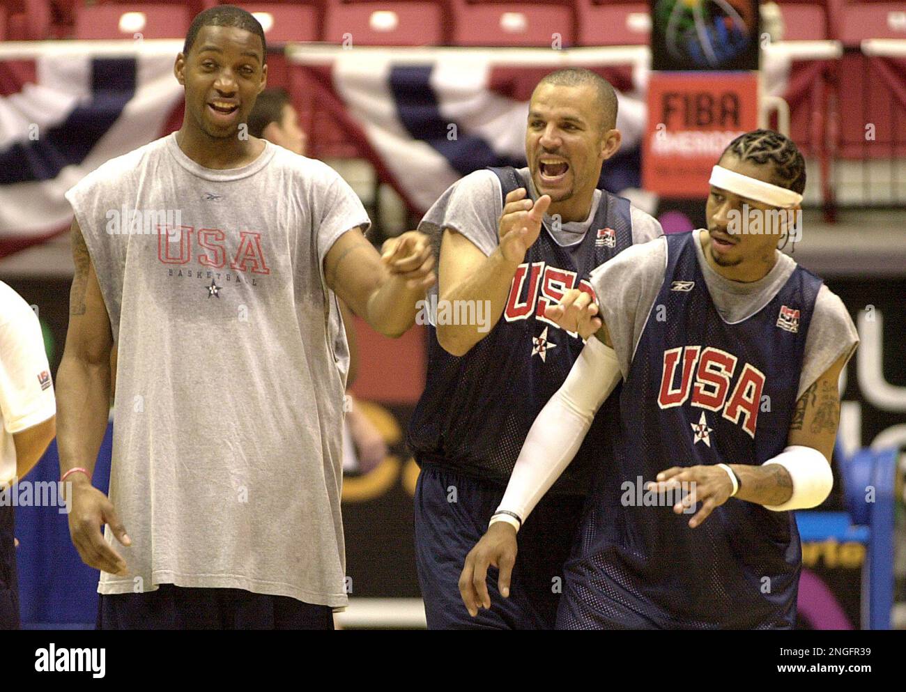 Allen Iverson, right, jokes with his USA teammates Jason Kidd, center ...