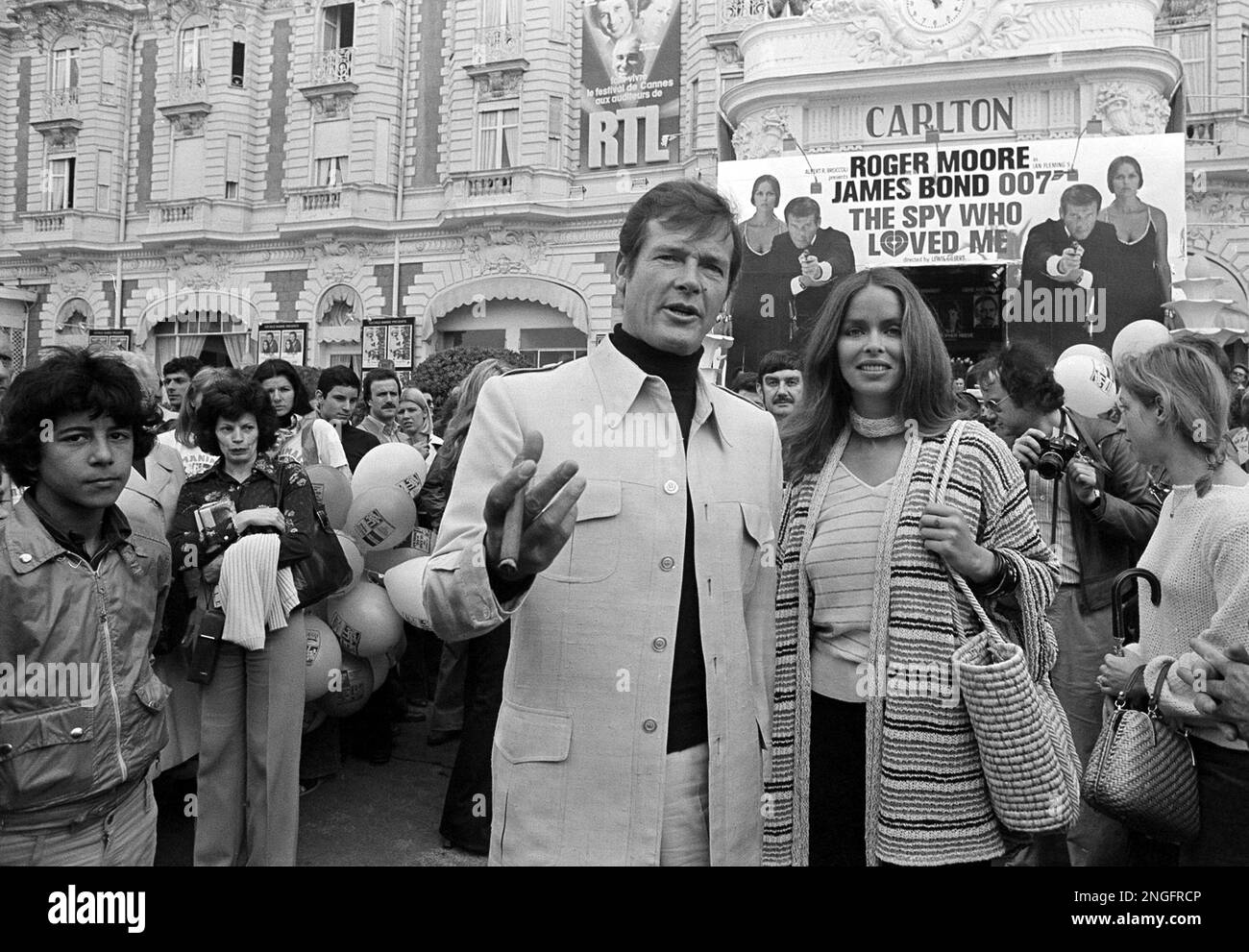 Actor Roger Moore, alias British secret agent James Bond, is ...