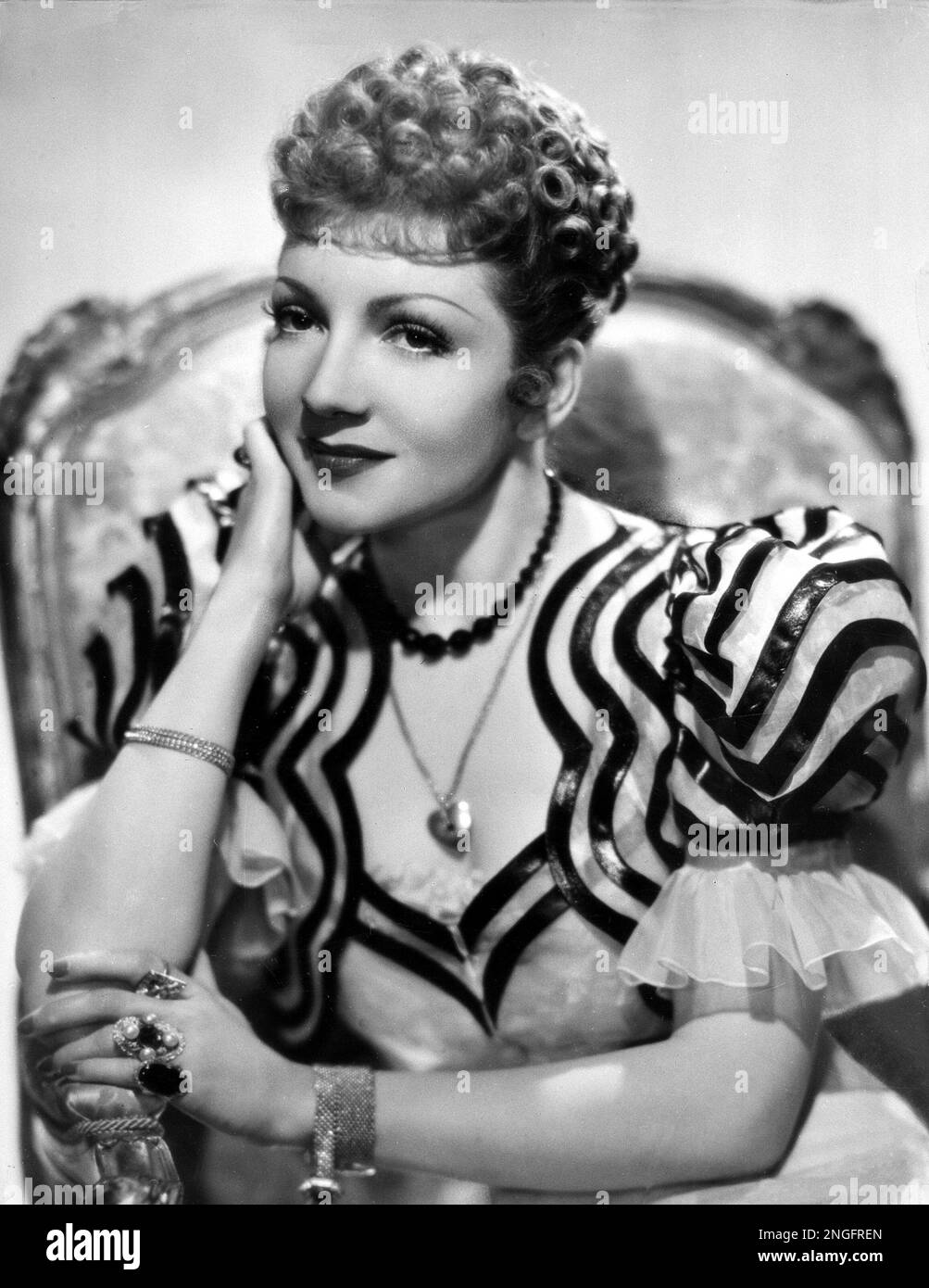 Actress Claudette Colbert is shown in costume for the title role in ...