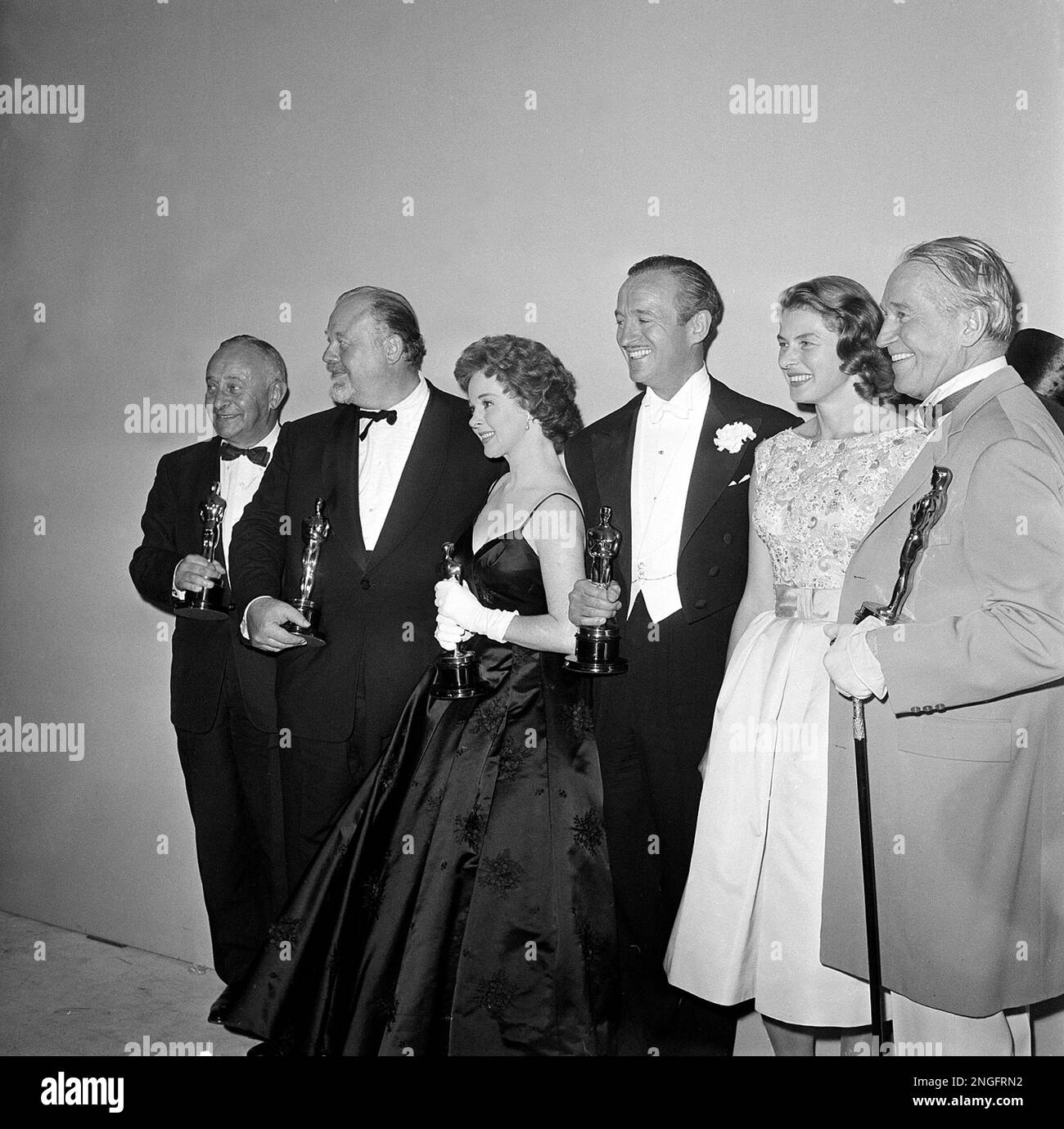 Presenter Ingrid Bergman, second from right, poses with Oscar winners ...