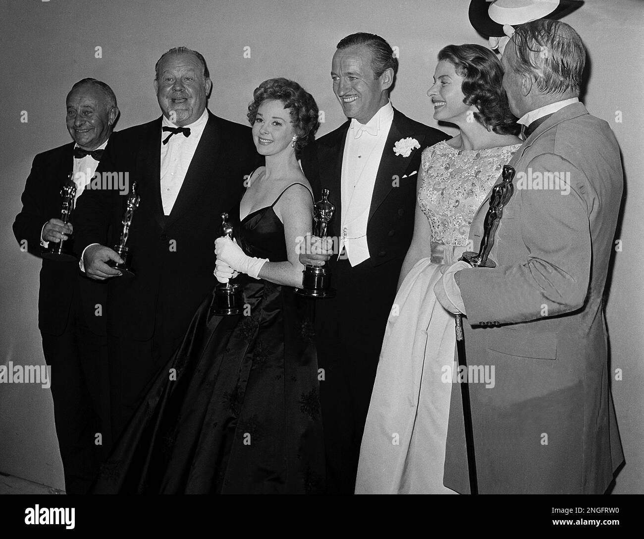 Presenter Ingrid Bergman, second from right, poses with Oscar winners ...