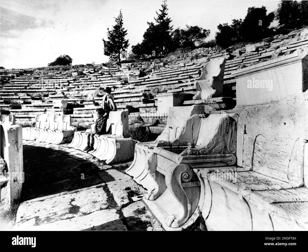 This is a partial view of the marble seats at the theater of Dionysus ...