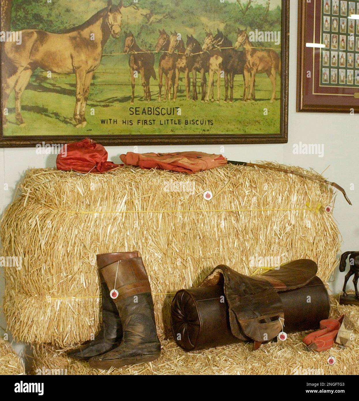 A painting of horse racing legend Seabiscuit and his offspring adorns ...