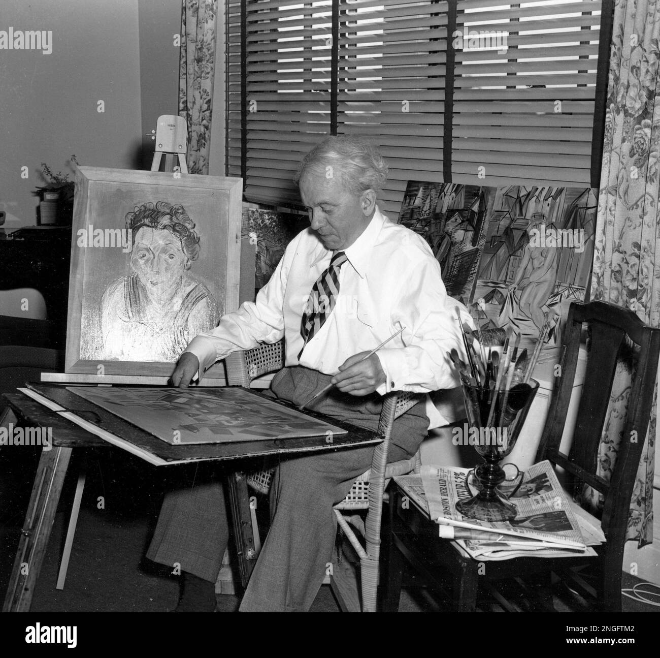 French painter Raoul Dufy works on a painting at the Jewish Memorial ...