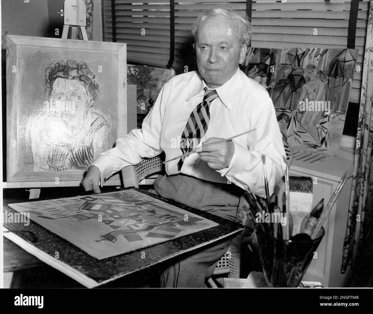 French painter Raoul Dufy works on a painting at the Jewish Memorial ...