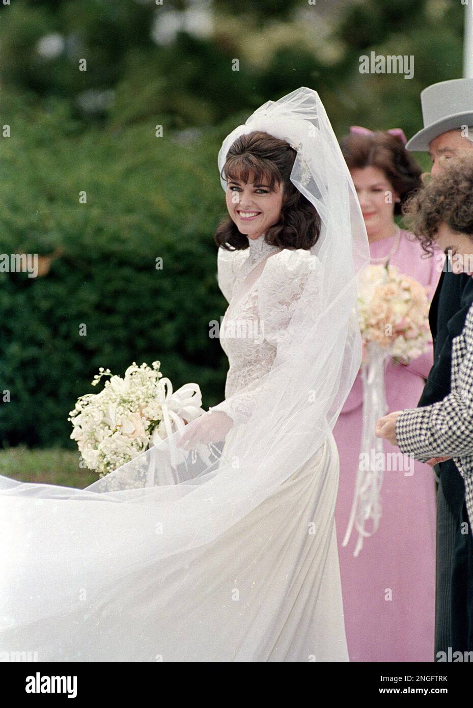 Maria Shriver smiles as she heads into St. Francis Xavier Church, in ...