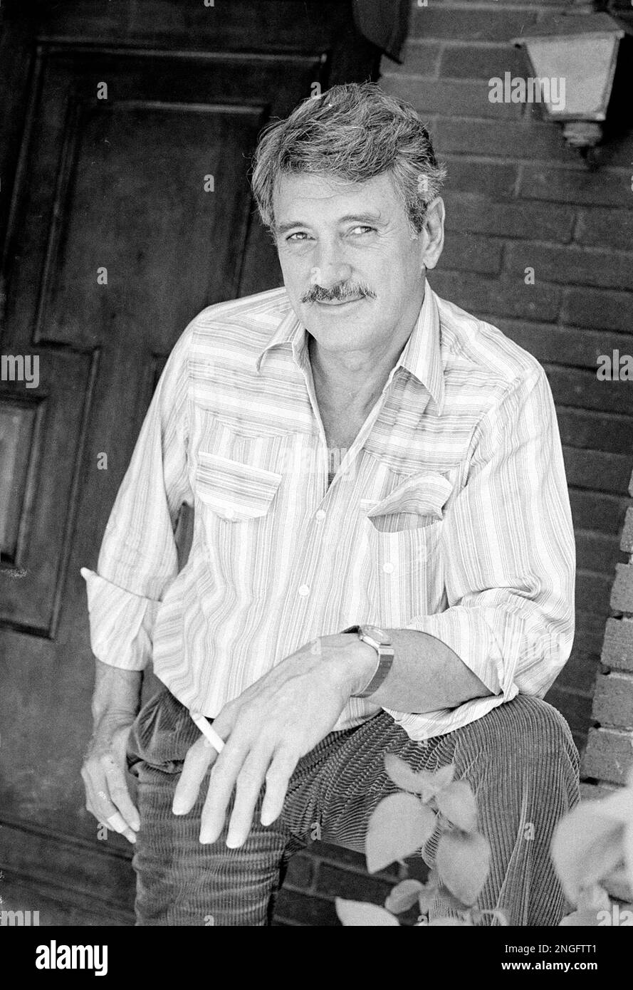 American actor Rock Hudson pauses outside a restaurant in Studio City ...