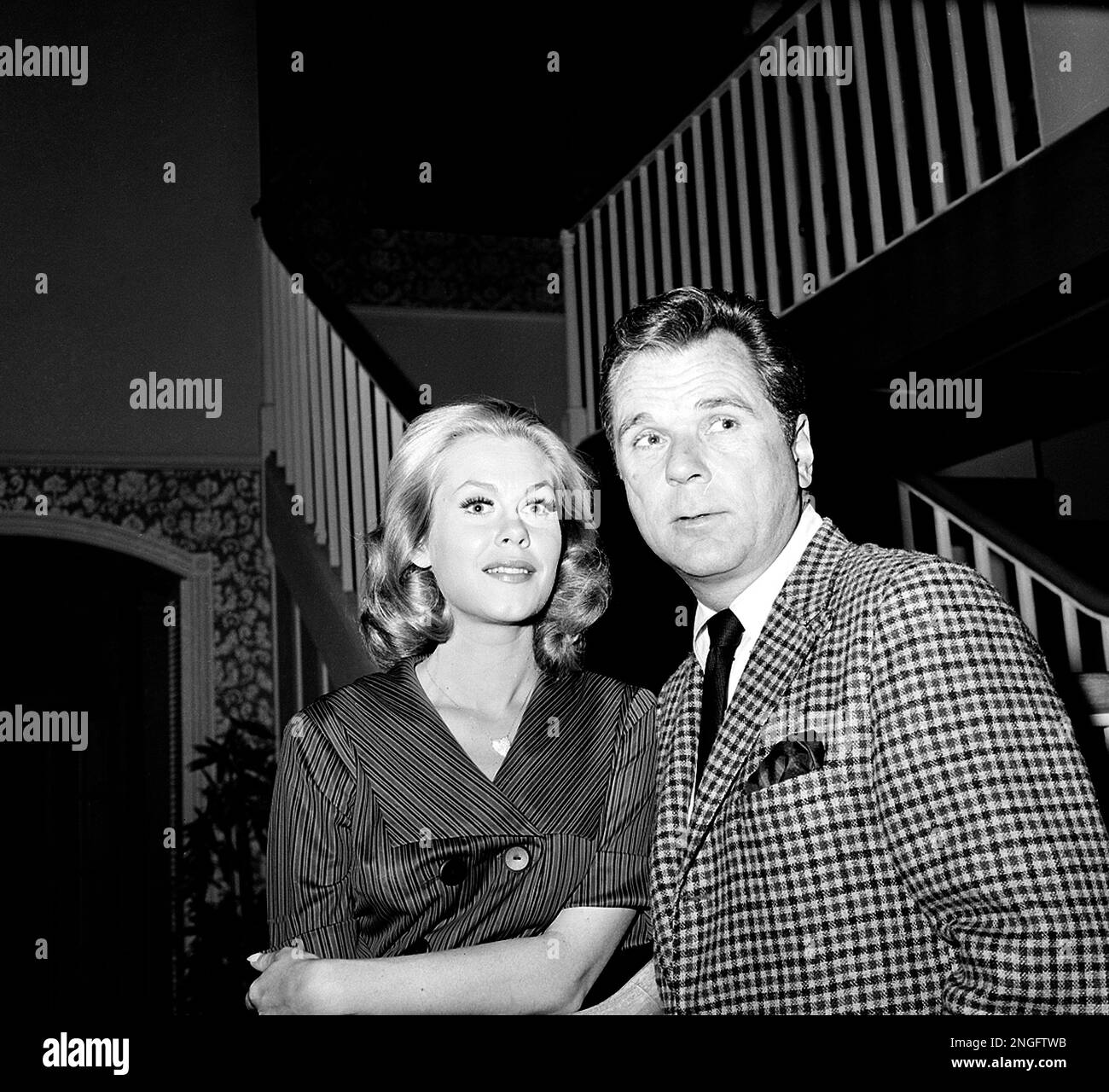 TV producer Jackie Cooper, former child actor, is seen with his wife ...