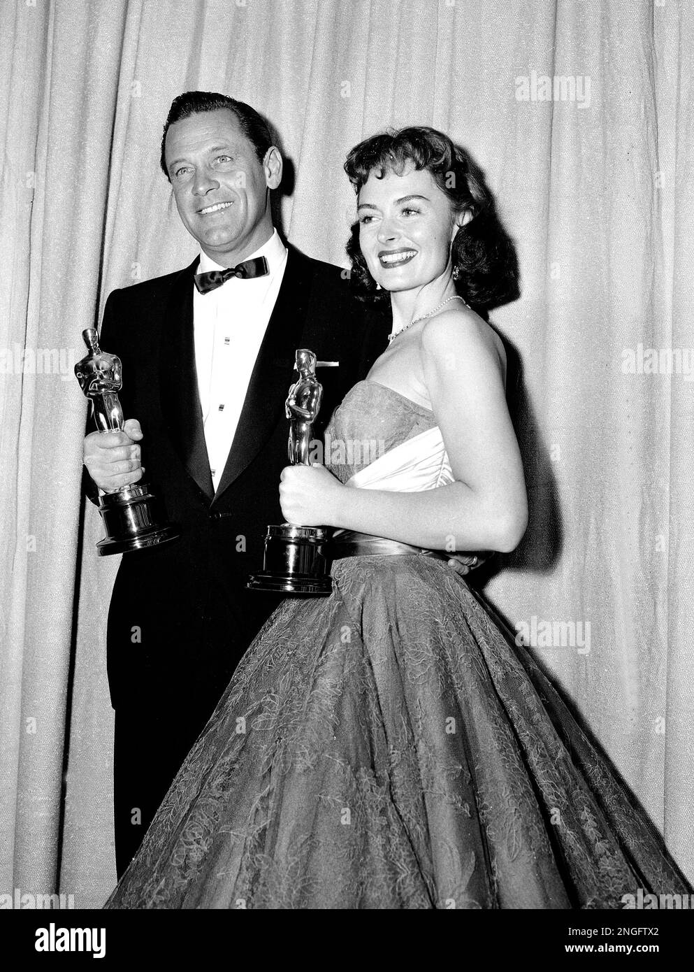 Actor William Holden and actress Donna Reed pose with the Oscars they ...
