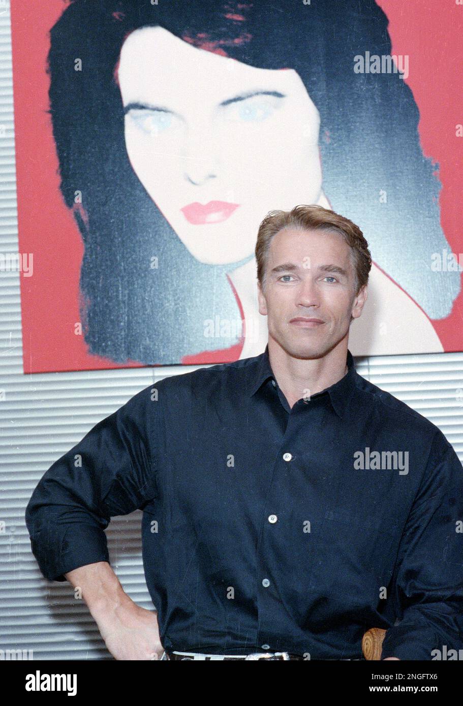 Hollywood action star Arnold Schwarzenegger poses in Los Angeles, Calif ...