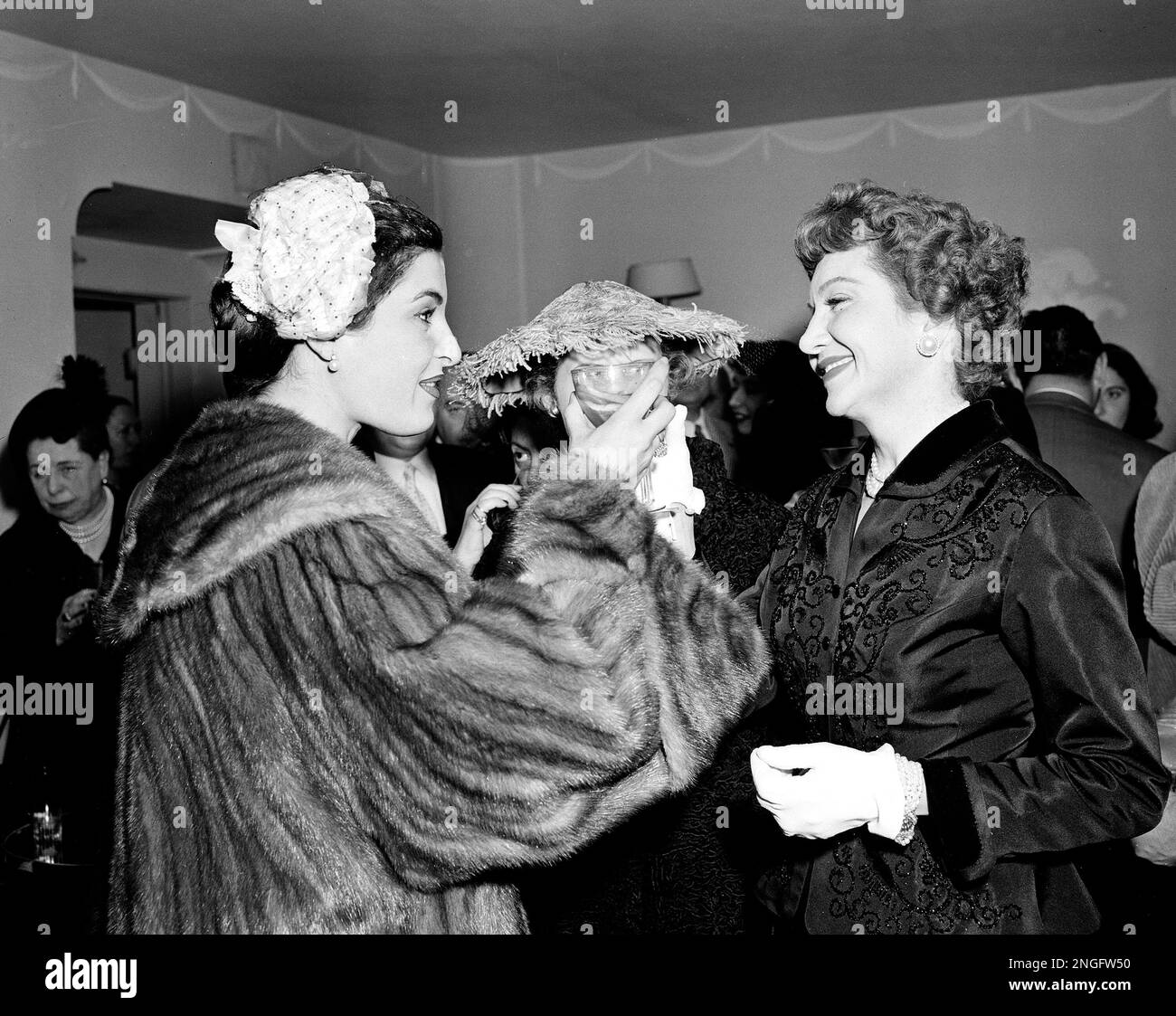 French-born American actress Claudette Colbert, right, and Italian ...