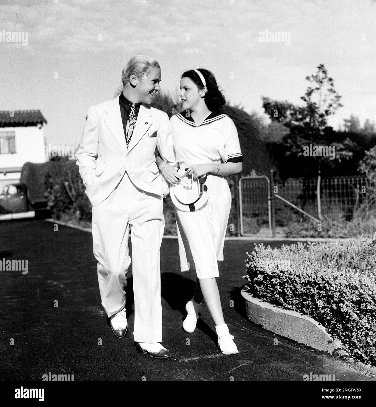 Actor Jackie Cooper and Judy Garland are shown together in Hollywood ...