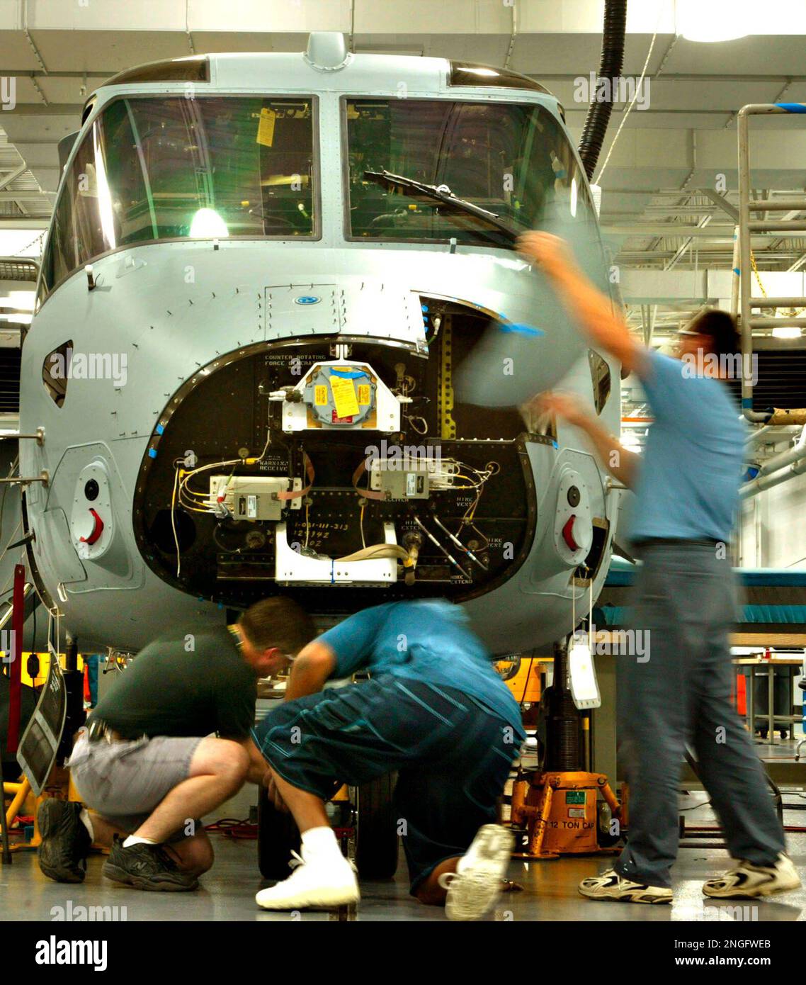 Workers assemble a V-22 Osprey Wednesday, June 25, 2003, at a new ...